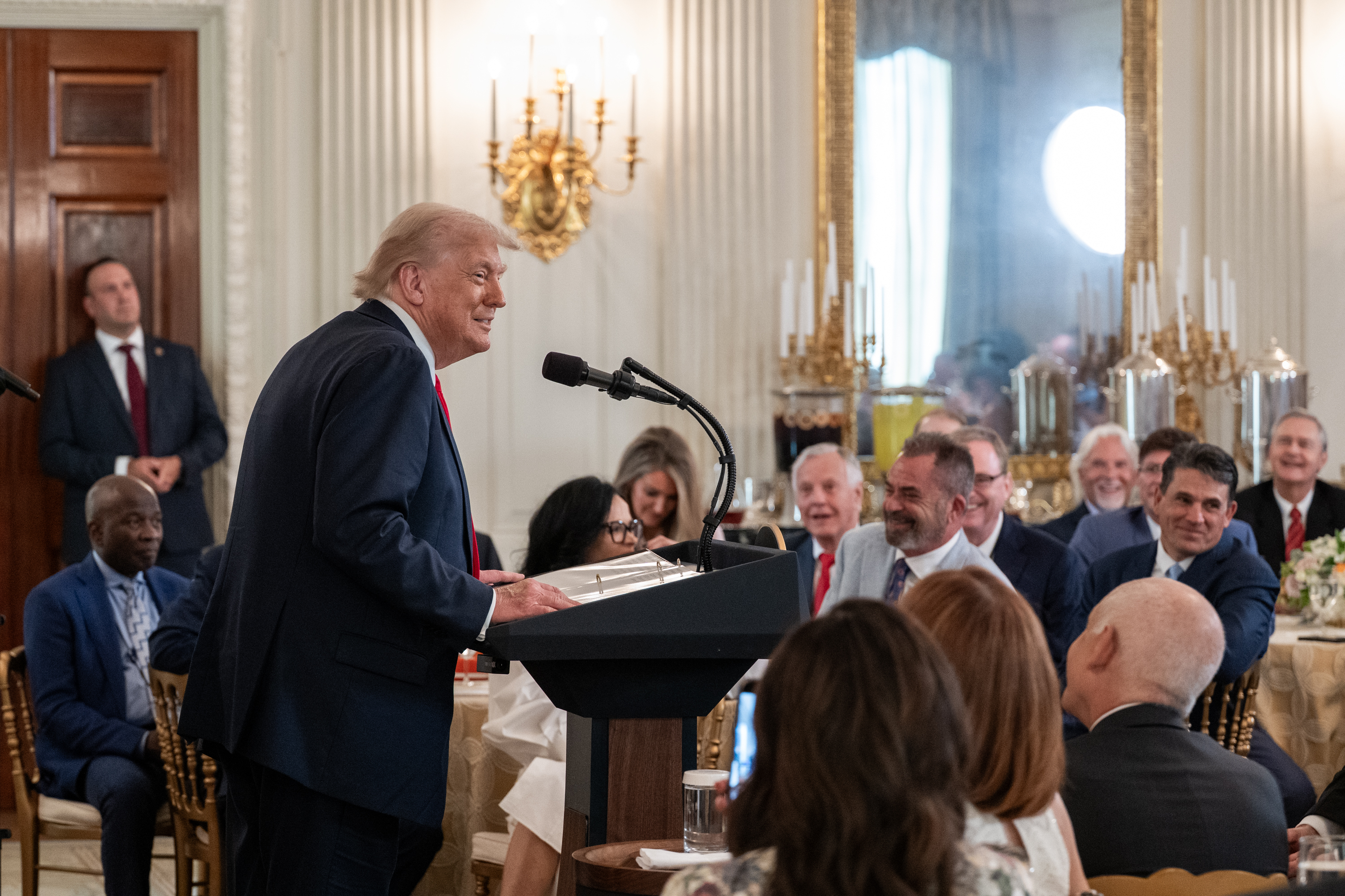 President Donald Trump delivers remarks at a luncheon and briefing with ...
