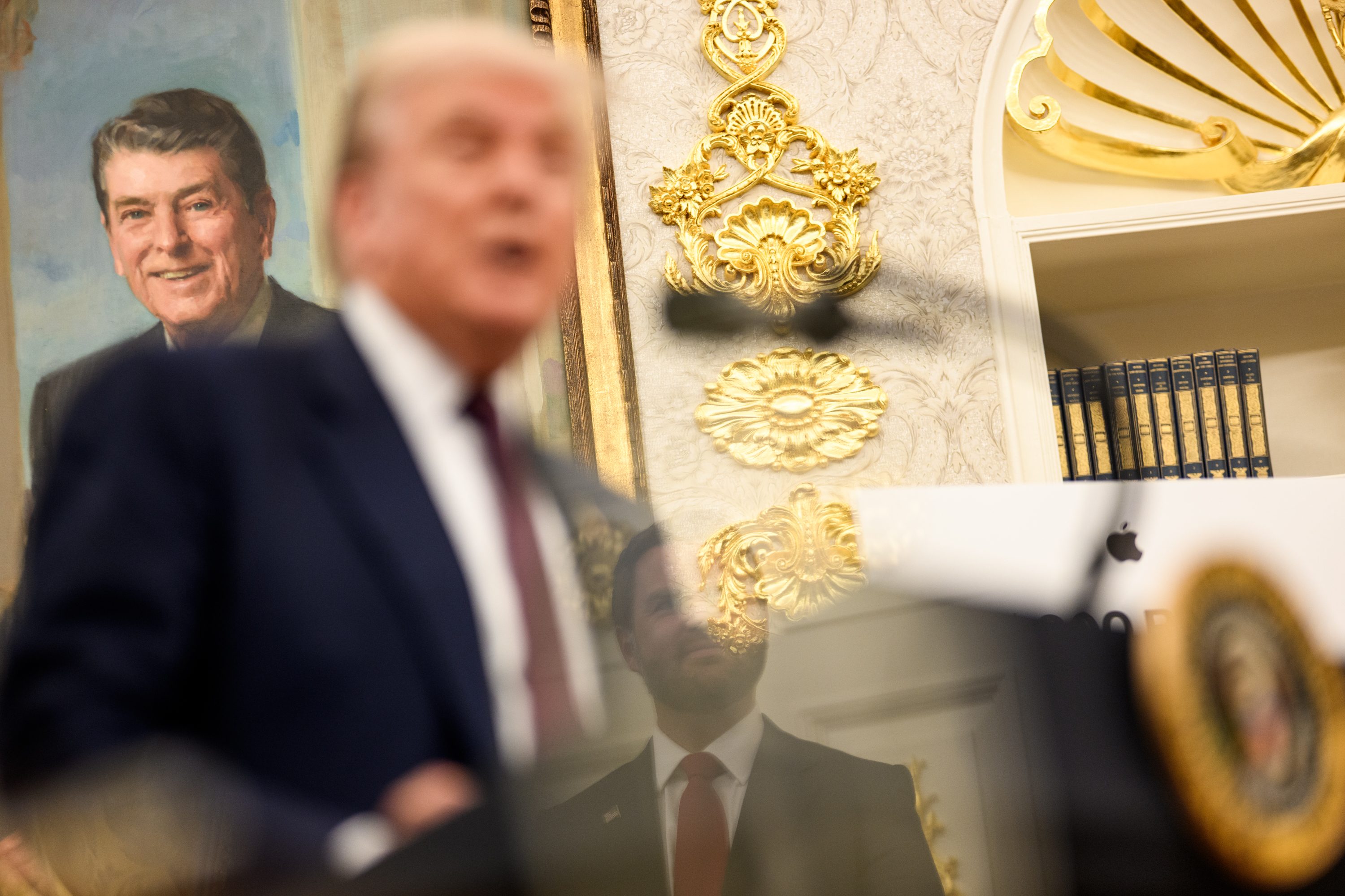 President Donald Trump delivers investment remarks alongside Apple CEO ...