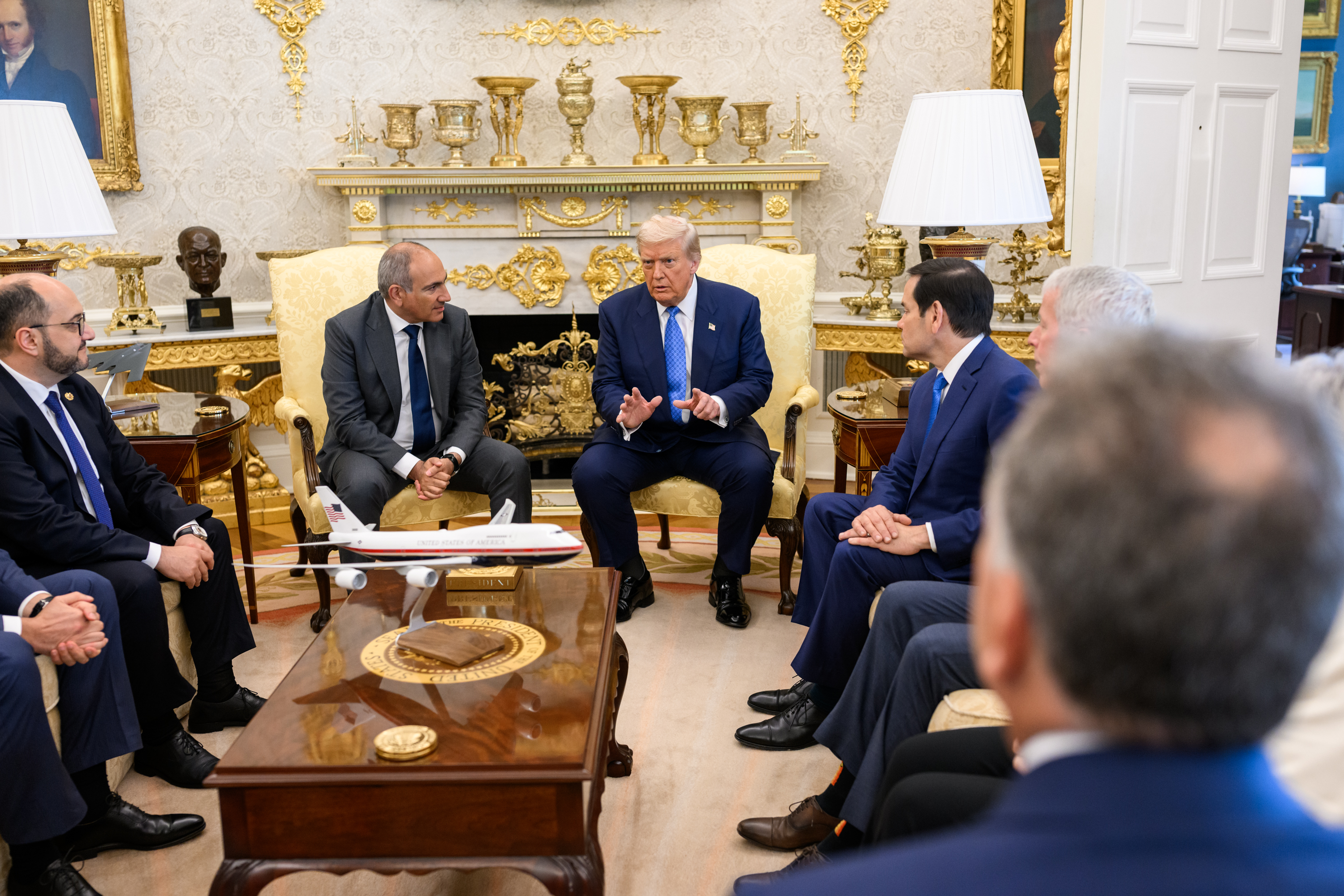President Donald Trump signs a trilateral joint declaration with ...