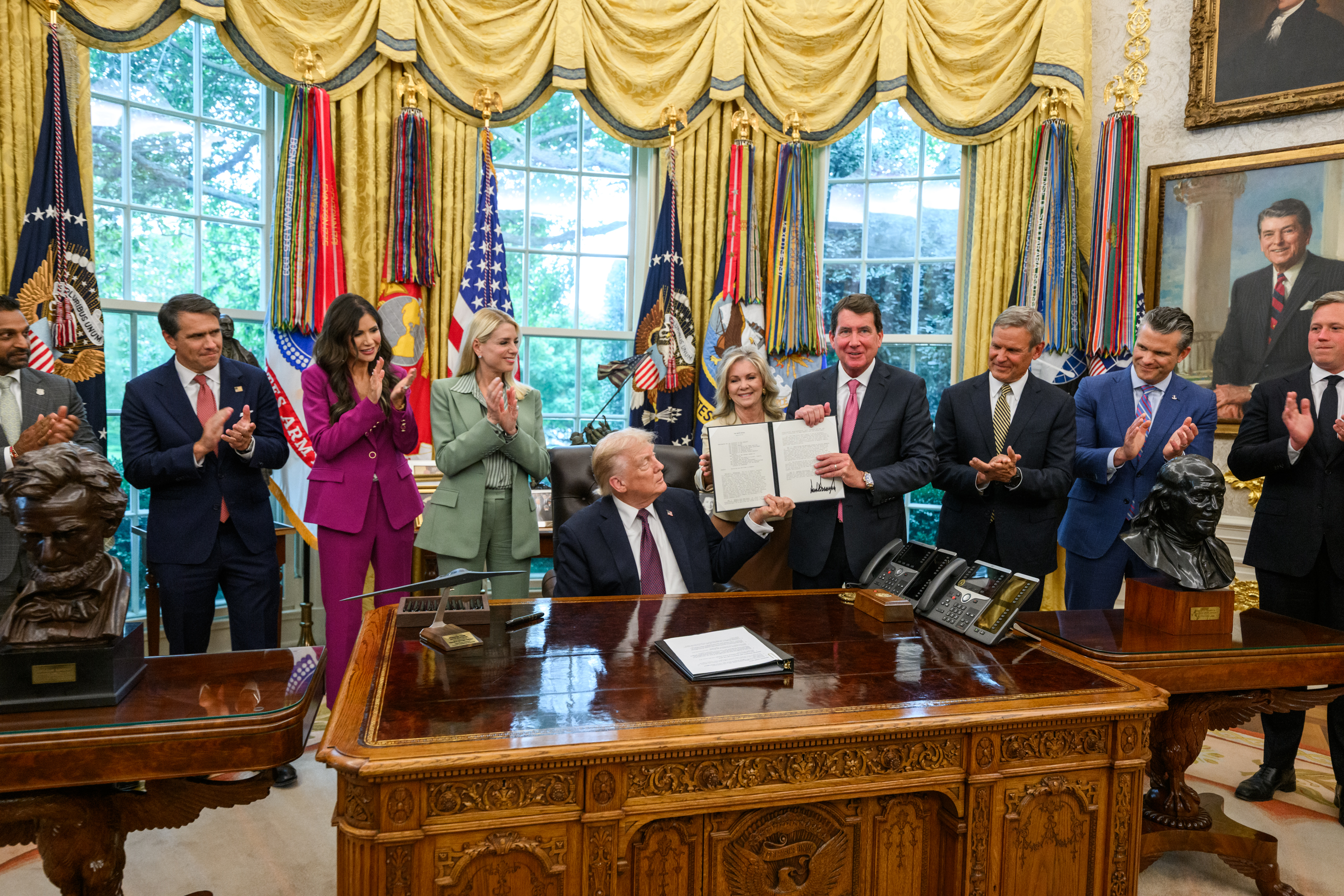 President Donald Trump signs a Presidential Memorandum that will deploy ...