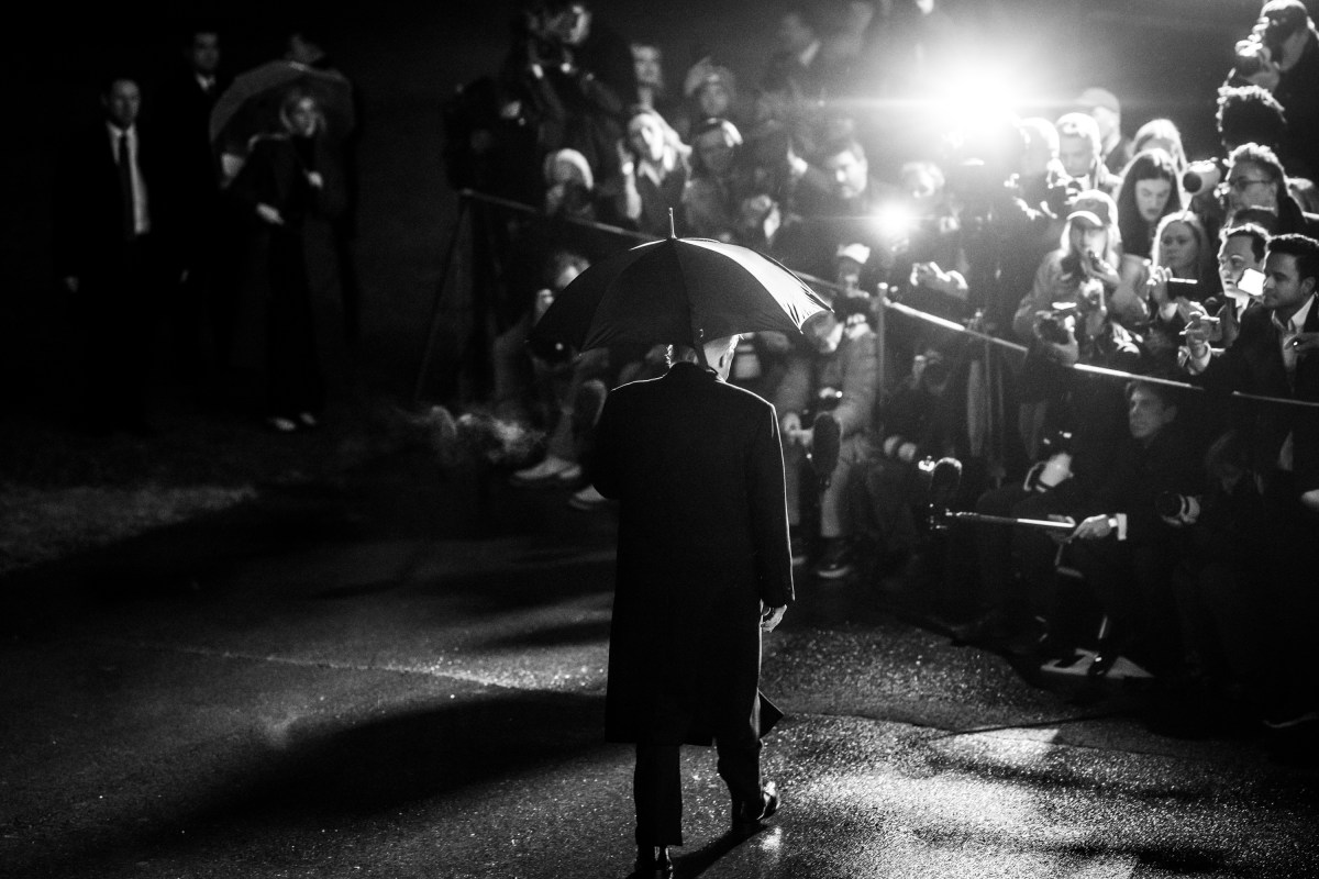 President Donald Trump speaks with members of the media before boarding ...