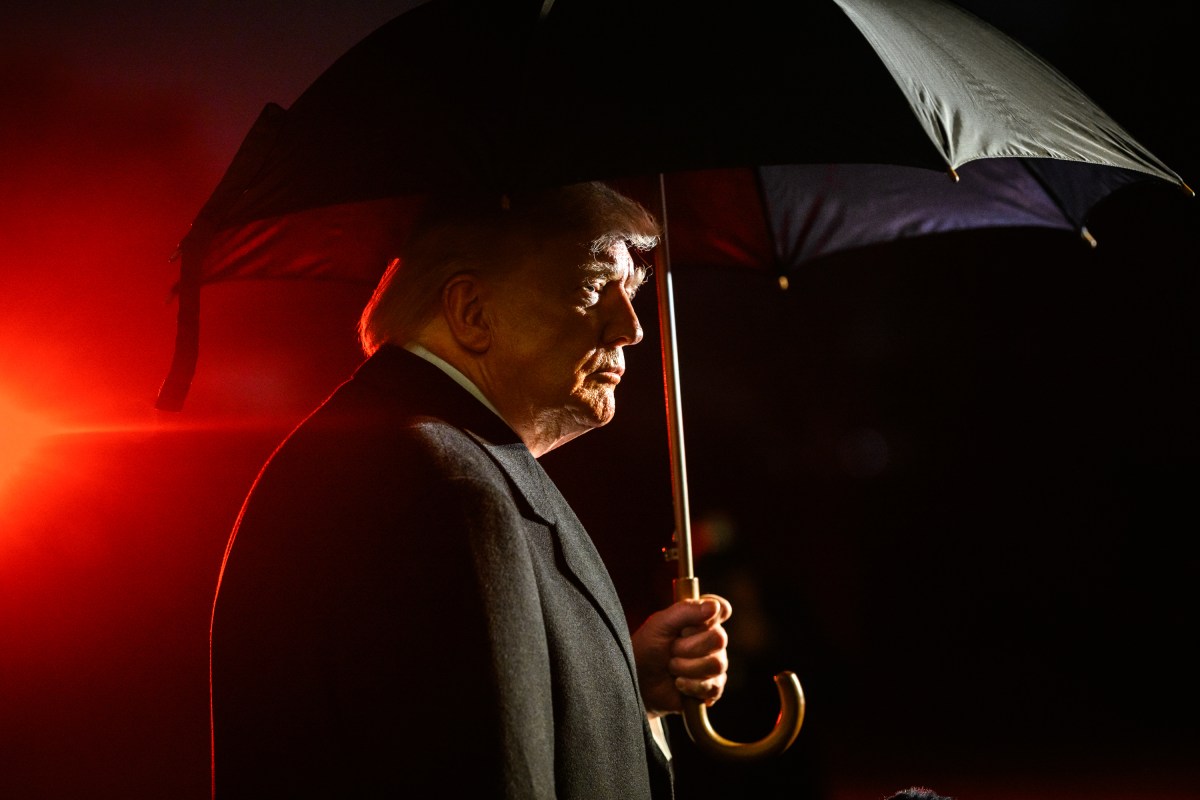 President Donald Trump speaks with members of the media before boarding ...